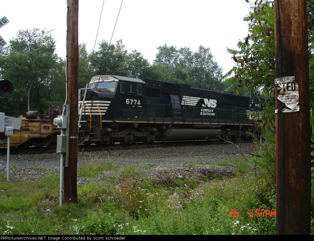 NS 6774 crosses over Carney's Crossing Rd. EB w/NS 65J